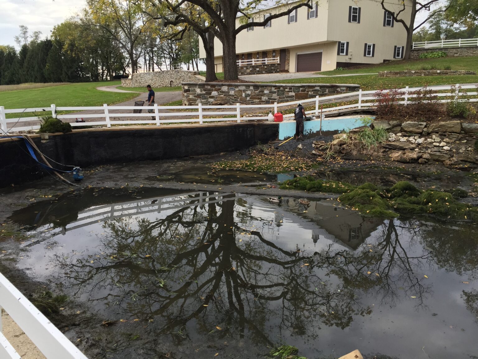 Repairing a 100-year-old concrete pond wall - Splash Supply Company